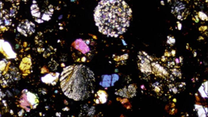 Photomicrograph of a thin section of a typical ordinary chondrite ...